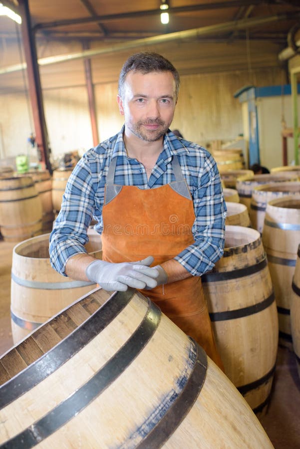 Wood Barrels Production Cooper Using Hammer and Tools in Workshop Stock ...