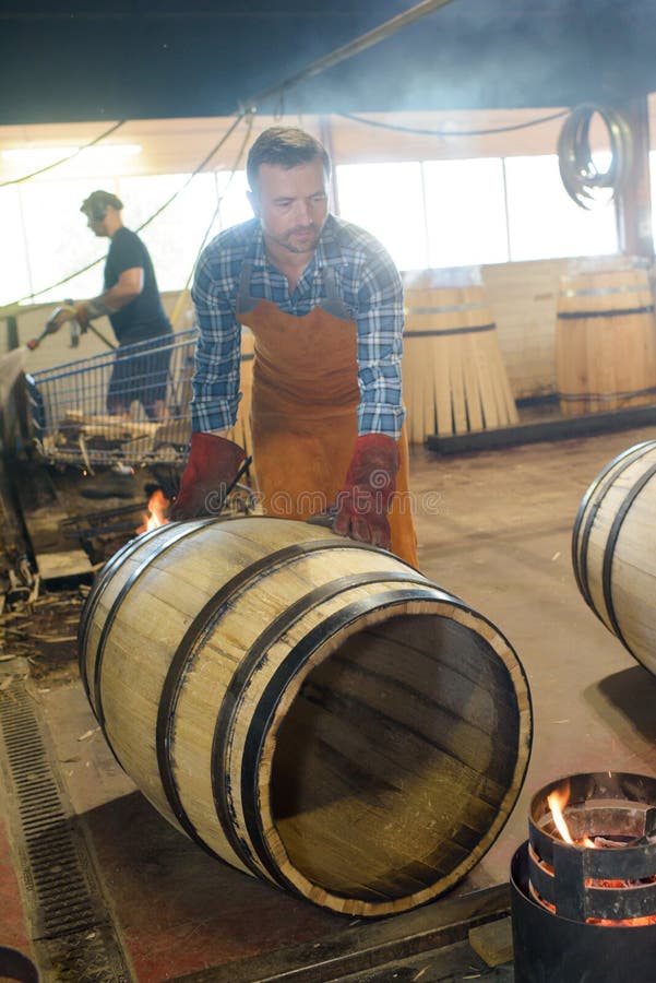Wood Barrels Production Cooper Using Hammer and Tools in Workshop Stock ...