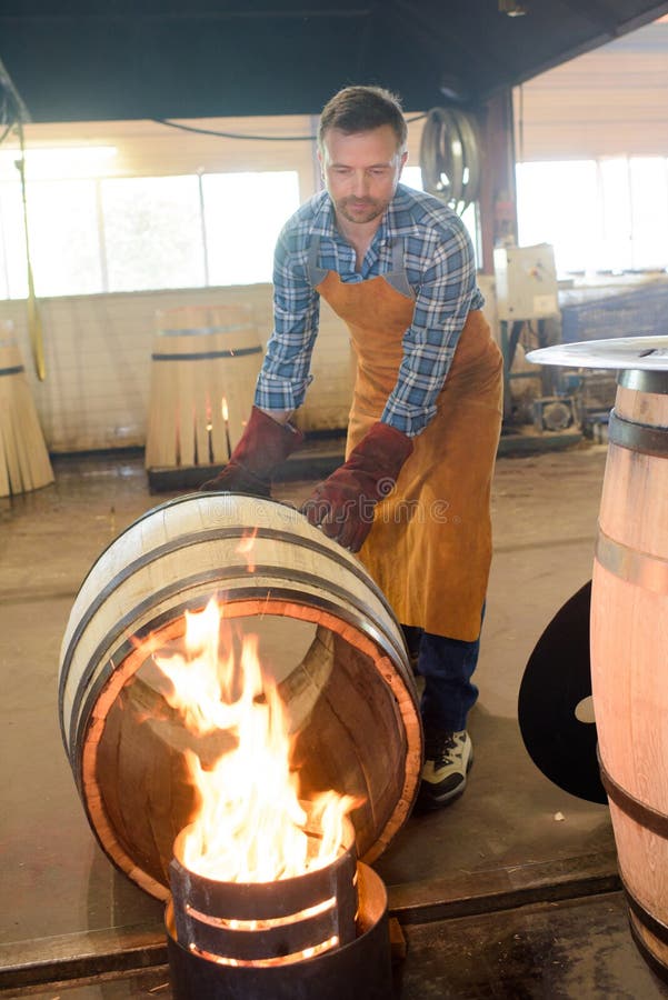 Wood Barrels Production Cooper Using Hammer and Tools in Workshop Stock ...