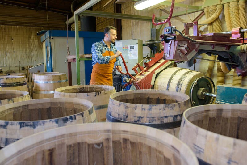Wood Barrels Production Cooper Using Hammer and Tools in Workshop Stock ...