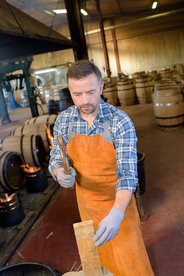 Wood Barrels Production Cooper Using Hammer and Tools in Workshop Stock ...