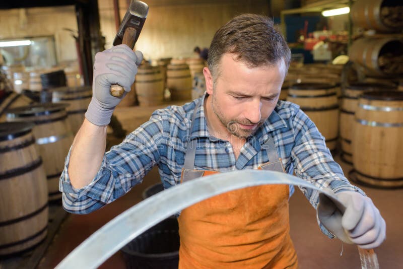 Wood Barrels Production Cooper Using Hammer and Tools in Workshop Stock ...