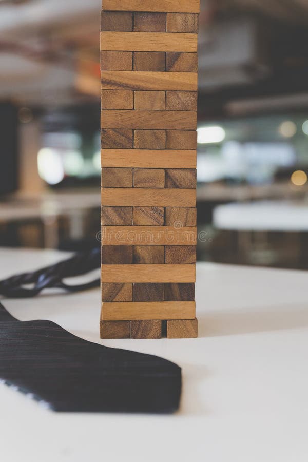 Wood Block and Neck Tile on Office Desk Stock Photo - Image of game ...