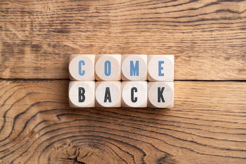 Wood Blocks Spelling COME BACK on Wooden Surface Stock Image - Image of ...