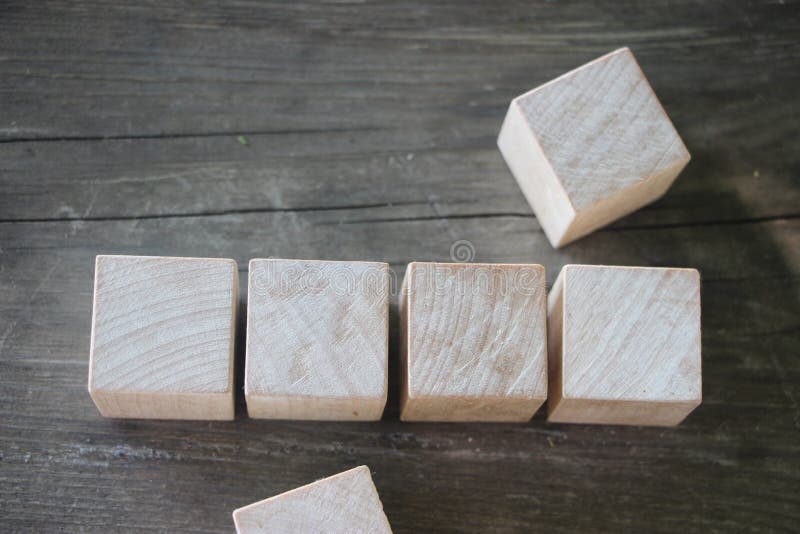 4 Wood Blocks Top View, on Wooden Table, Polished Wooden Table ...