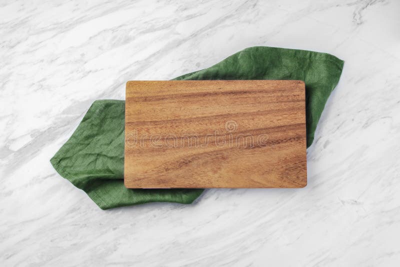Wood Board on Green Kitchen Cloth on Natural Marble Table Stock Image ...