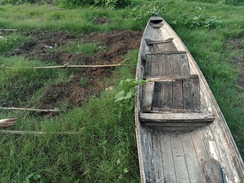 Wood boat on grass stock photo. Image of soil, agriculture - 199790074