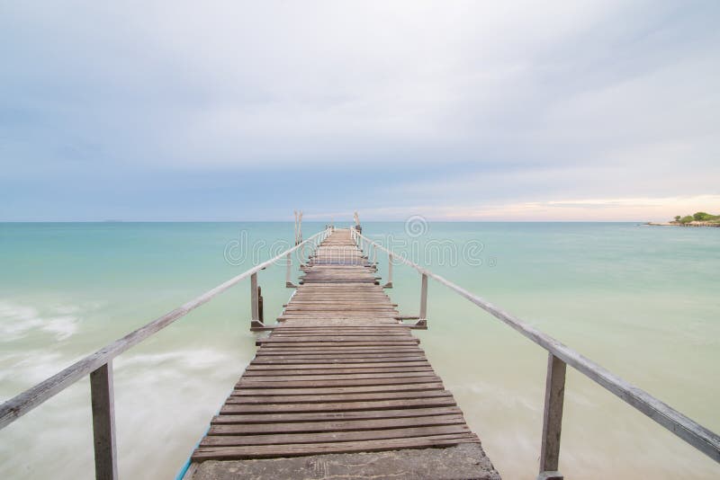 Wood Bridge on the beach stock photo. Image of peaceful - 55845754