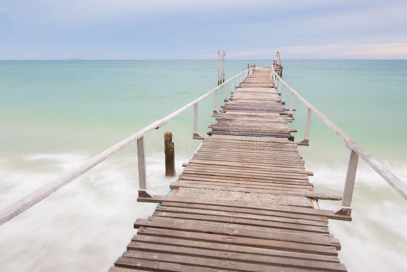 Wood Bridge on the beach stock photo. Image of road, lake - 55845766