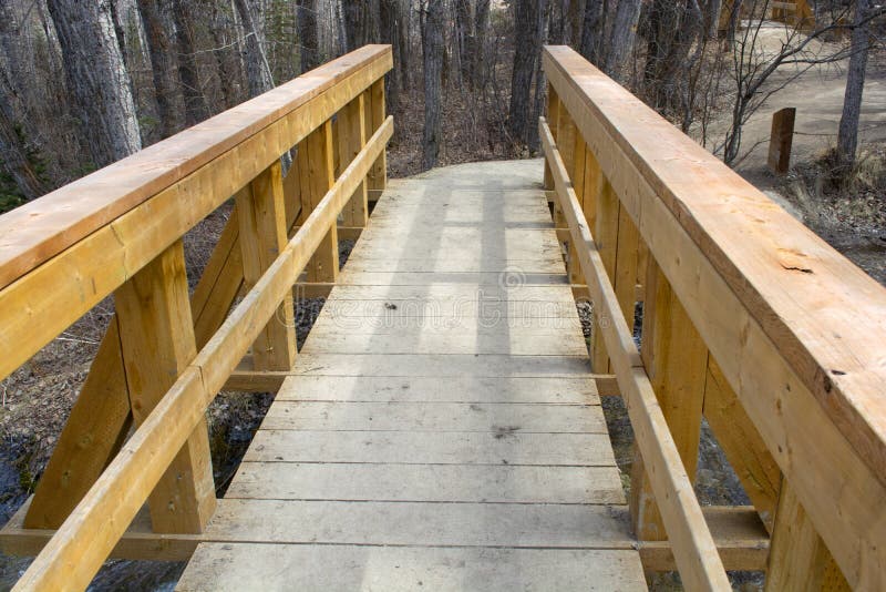 Wood Bridge Over Small Creek in Park Forest Stock Image - Image of snow ...