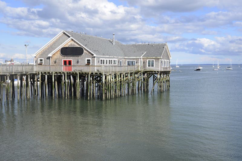 Shingle Building by Water and Dock Stock Photo - Image of autumn, entry ...