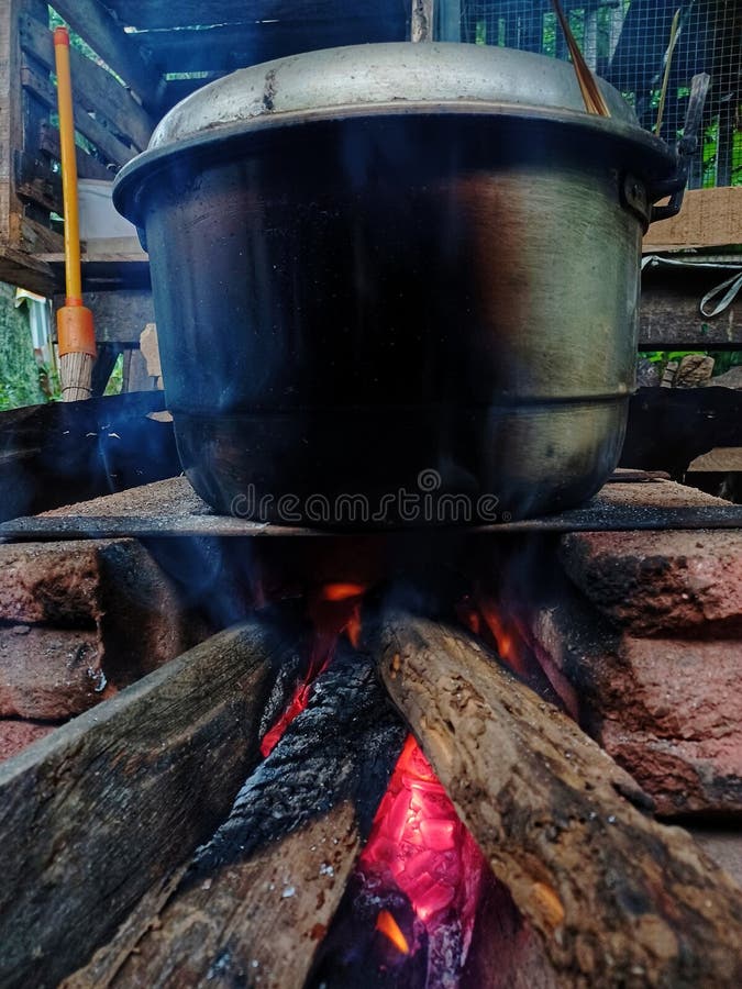 Wood Burned by the Fire on the Pot Stock Photo - Image of fire, iron ...
