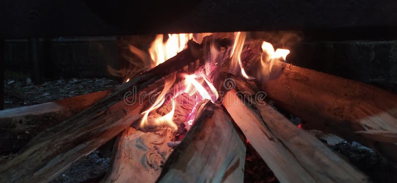 Wood Burned Over a Large Fire Stock Image - Image of wood, fire: 323956187