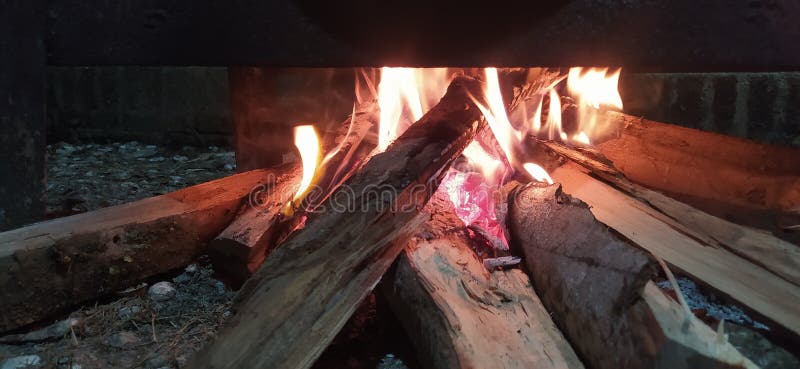 Wood Burned Over a Large Fire Stock Image - Image of large, burned ...