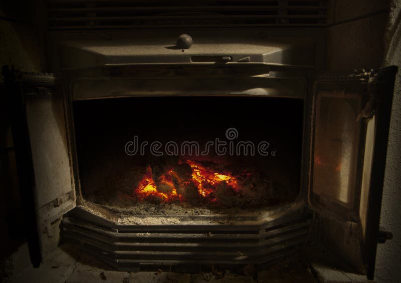 Wood burner with glow stock photo. Image of flame, fireplace - 18451964