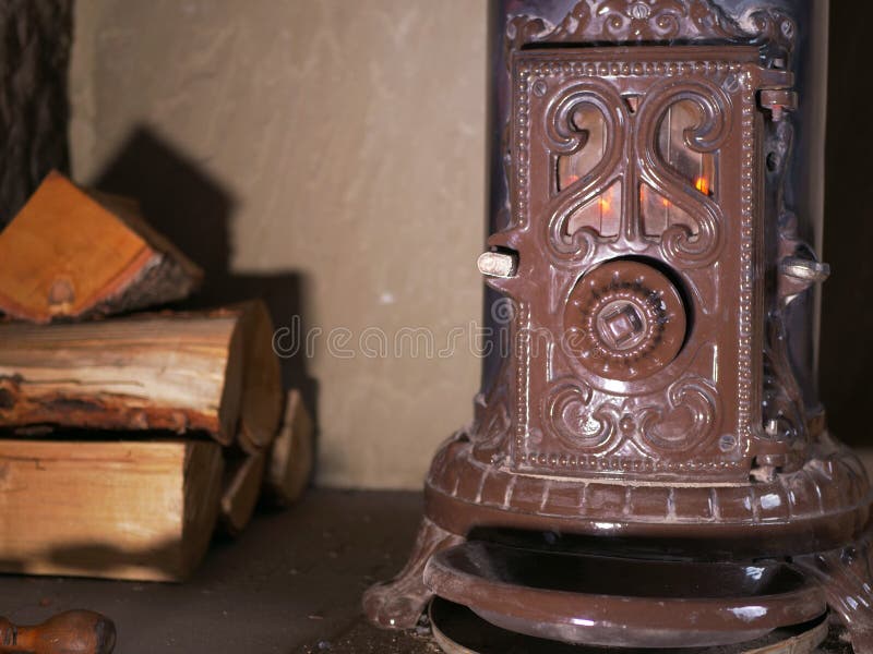 Wood Burner Stove with Logs in Hearth Stock Photo - Image of antique ...