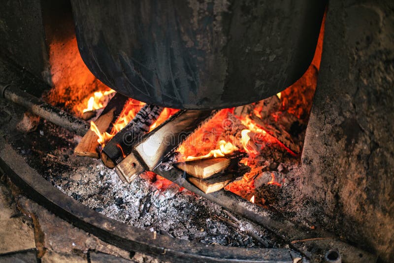 Wood fire under pot stock photo. Image of fire, home - 252295208