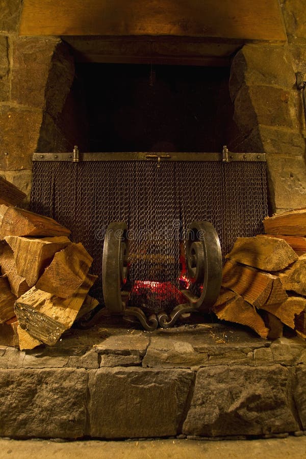 Wood Burning Stone Fireplace Stock Photo - Image of hearth, lodge: 13458088