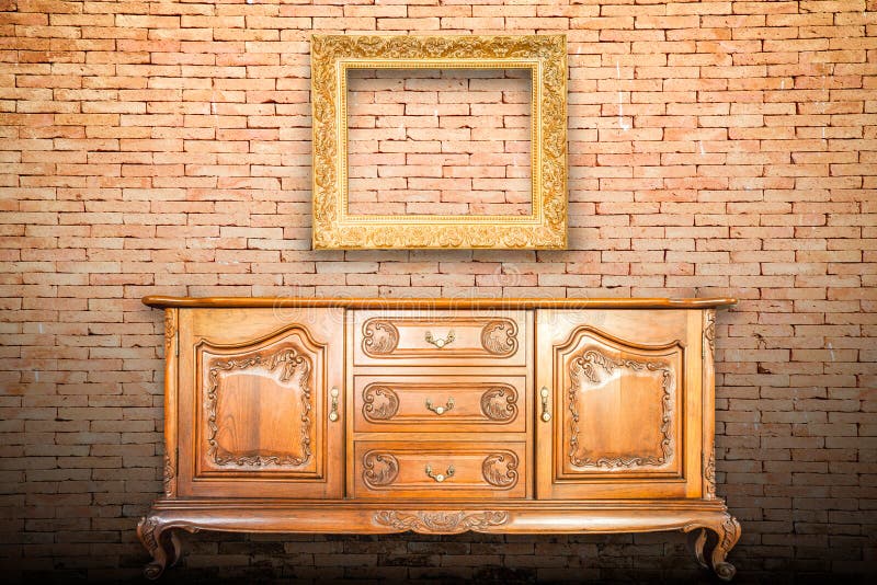 Wood Cabinet and Gold Frame Stock Photo - Image of cupboard, decoration ...