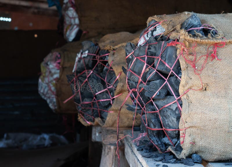 Wood Carbon in Sacks for Energy Stock Photo - Image of sack, material ...