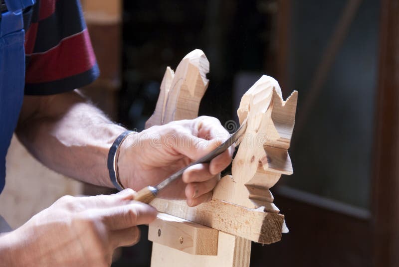 Wood carver at work stock image. Image of hands, create - 10859821