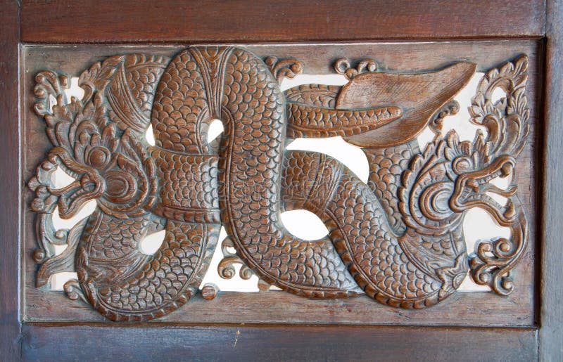 Wood carving of nagas stock image. Image of buddhist - 40106711