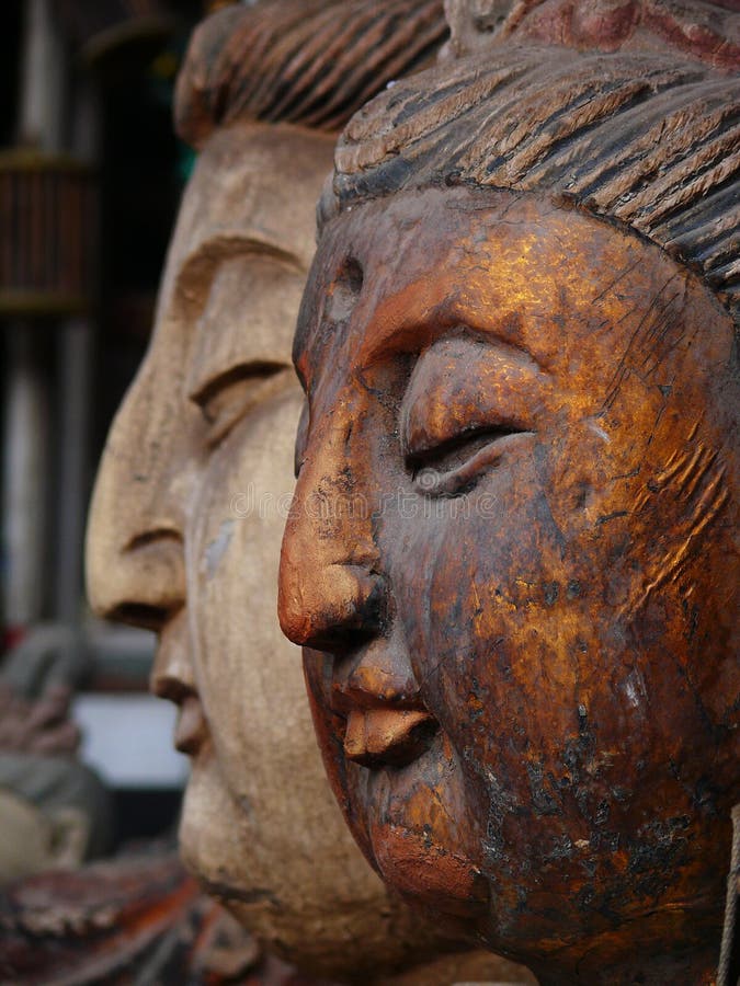 Wood carving statues stock image. Image of buddhist, stone - 8310039