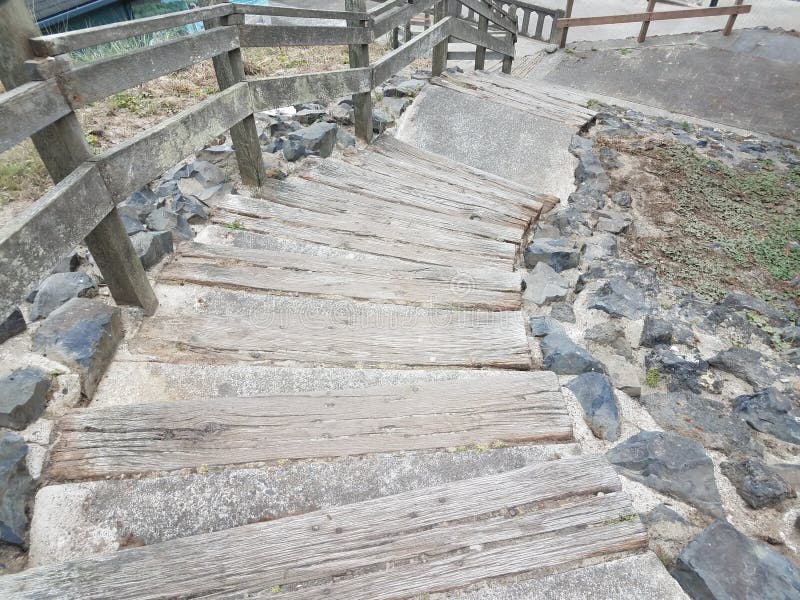 Wood and Cement Steps Going Down with Railing Stock Photo - Image of ...