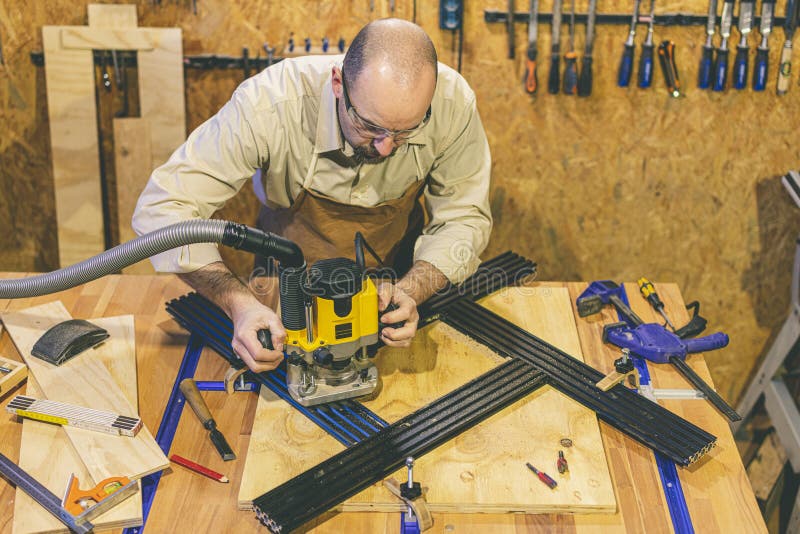 Wood Craftsman Using Router Stock Photo - Image of woodworker ...
