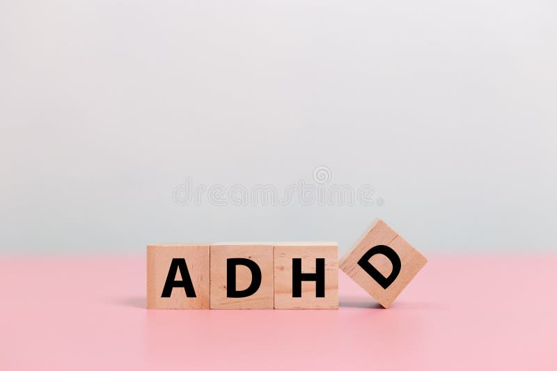 Wood Cube Block Abbreviation of ADHD on Pink Table. Attention Deficit ...
