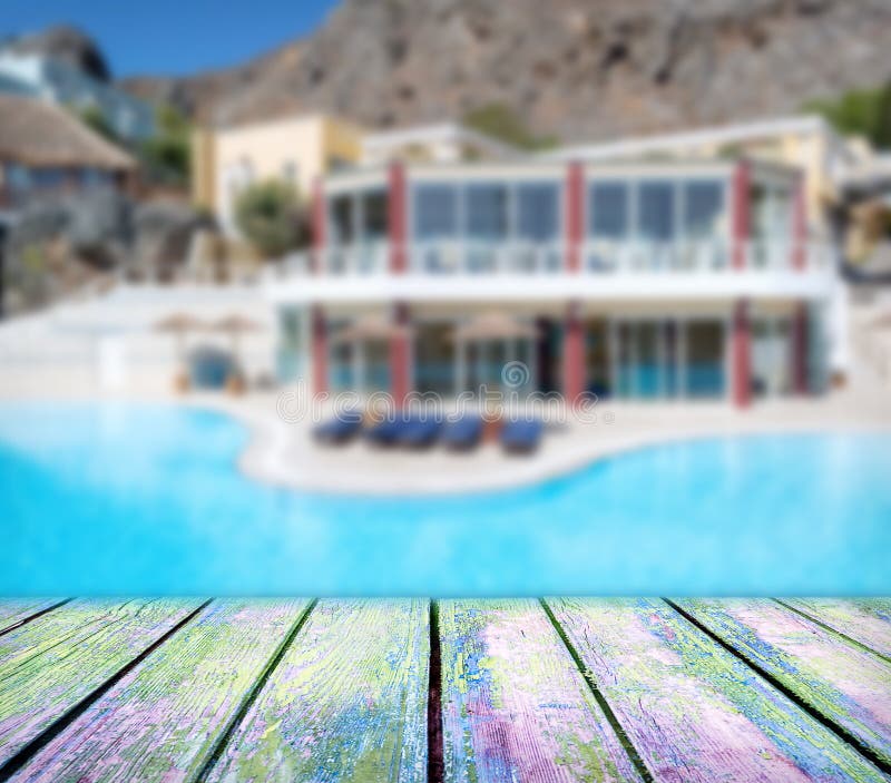 Wood Deck in Front of Luxury Hotel with Pool Stock Image - Image of ...