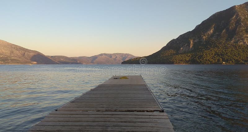 Wood dock path in the sea stock image. Image of dock - 206999287