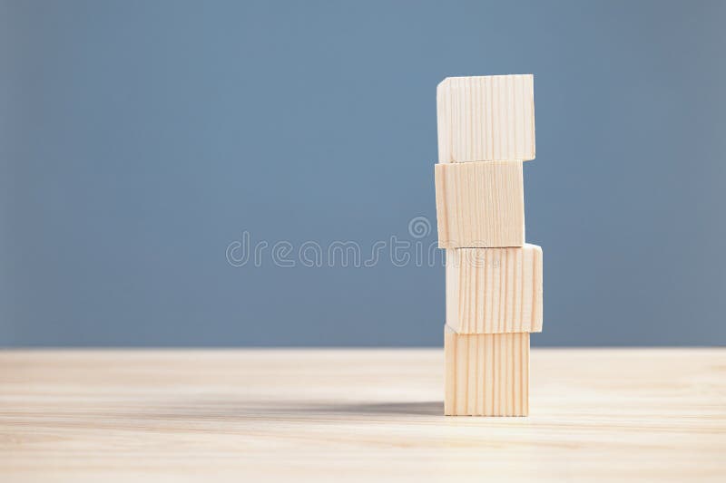 Wood Empty Four Blocks Stack on Table and Blue Blackground with Copy ...