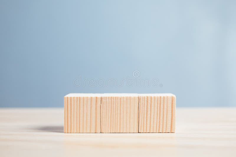 Wood Empty Three Blocks on Table and Blue Blackground with Copy Space ...