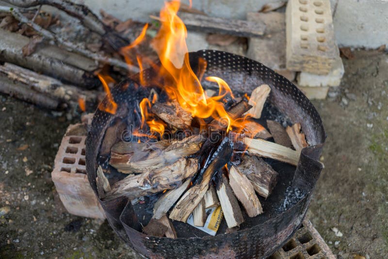 Wood Fire for Barbecue in Black Metal Container Stock Photo - Image of ...