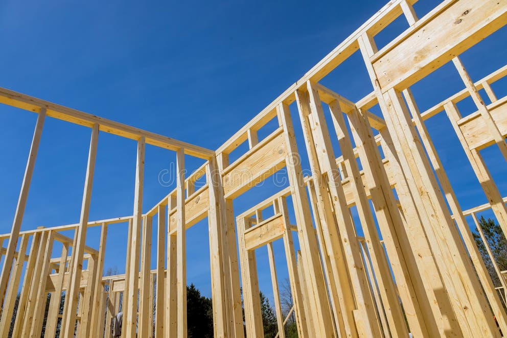 Wood Frame of a New House during Construction, Framed by Timber Wood ...