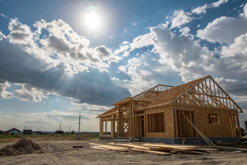 Wood Framing Structure at Construction Site Under Cloudy Sky Stock ...