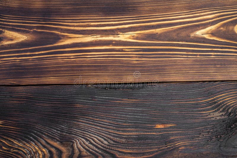 The Wood Grain is Very Visible and the Wood is Burnt. the Burnt Wood ...