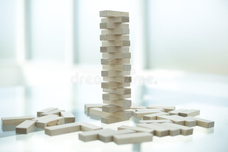 Wood Jenga on Glass Table in Bright Room Stock Photo - Image of hazard ...