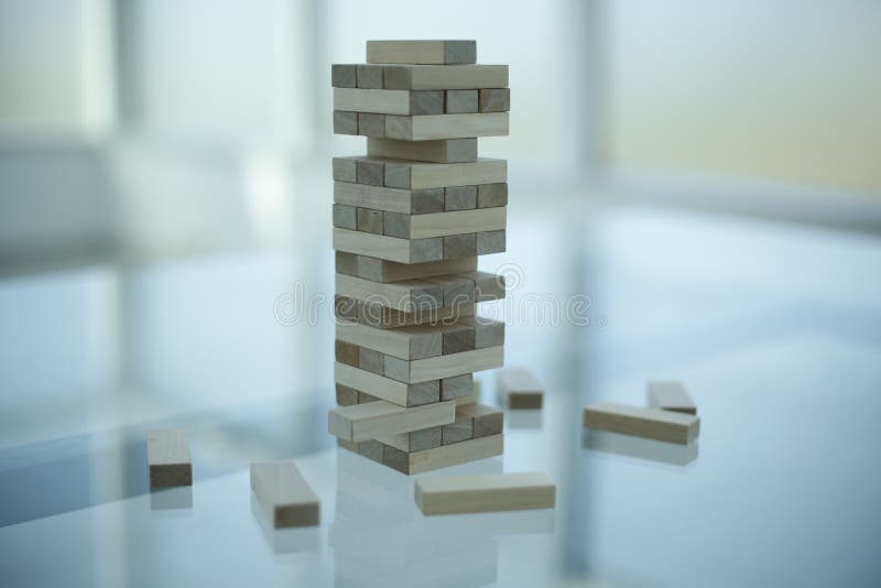 Wood Jenga on Glass Table in Bright Room Stock Photo - Image of stack ...