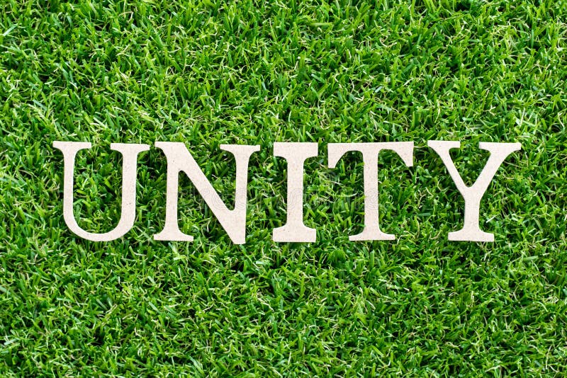 Wood Letter in Word Unity on Green Grass Background Stock Photo - Image ...