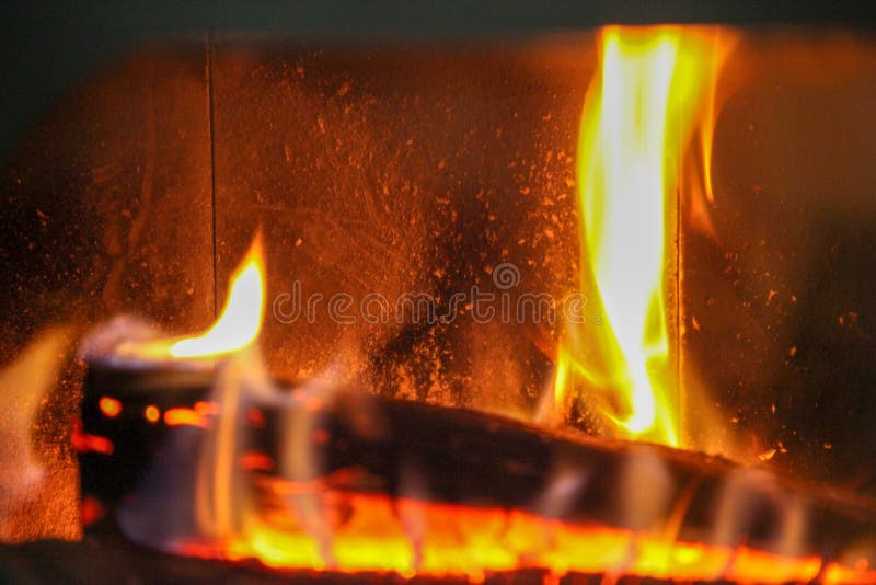 Wood log in a fire place stock image. Image of design - 133492121