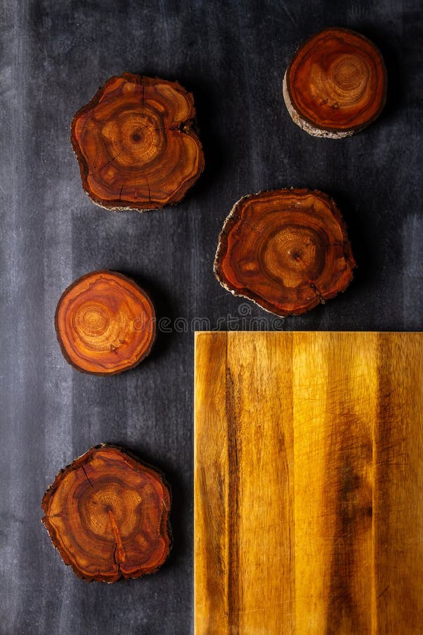Wood Log Tree Slices and Cutting Board on Chalkboard Stock Image ...