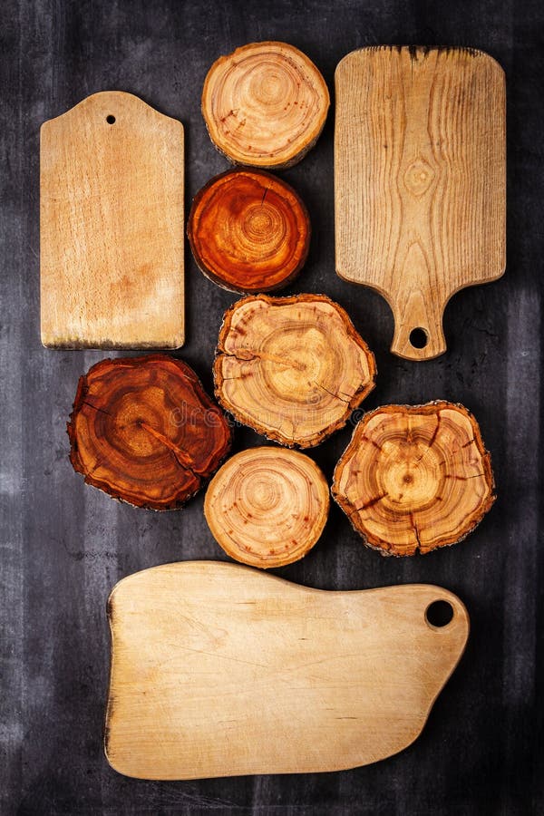 Wood Log Tree Slices and Cutting Boards on Chalkboard Stock Photo ...