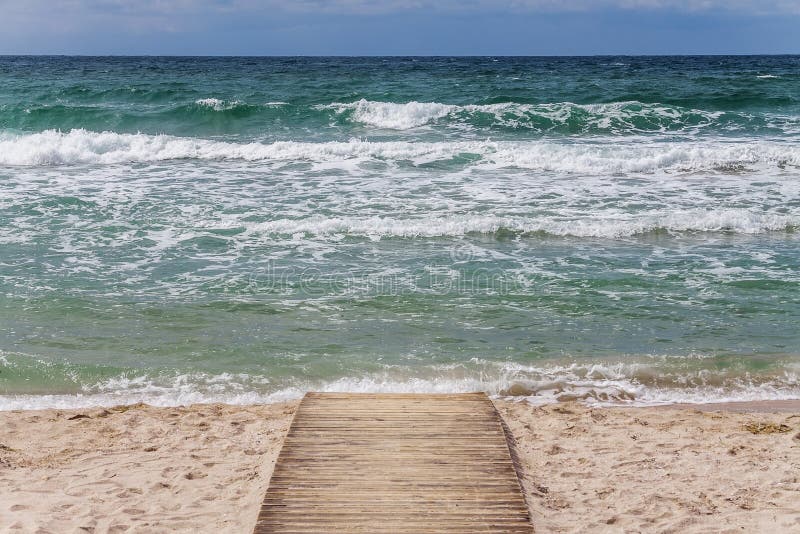 Wood path to the sea stock image. Image of seaside, wood - 127618583