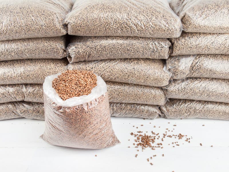 Wood pellets in bags stock image. Image of store, energy - 42328677