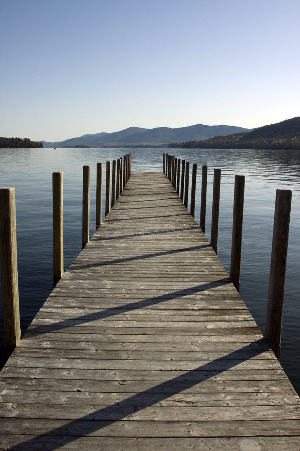 Wood Pier stock photo. Image of lake, calm, george, mountains - 10836746