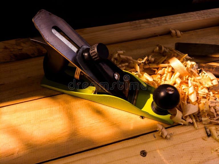 Hand Plane with Wood Shaving on Wood Background Stock Photo - Image of ...