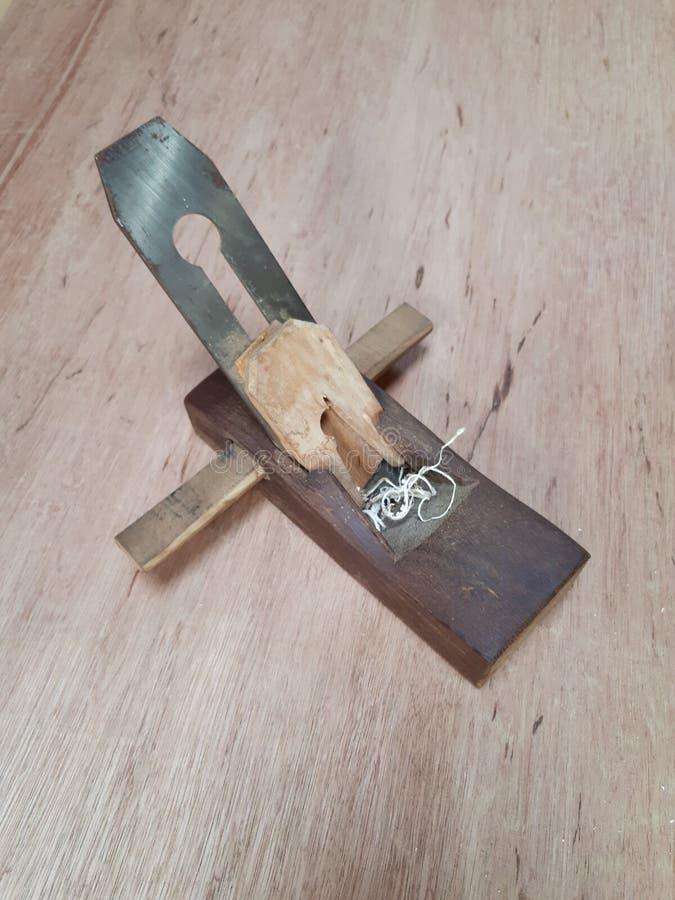 Wood plane on wood table stock photo. Image of plane - 92691208