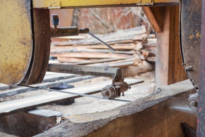 Wood Processing on a Sawmill. Sawing and Drying of Wood Stock Image ...